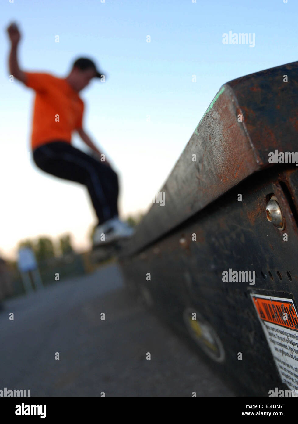 A skater doing a trick Stock Photo - Alamy