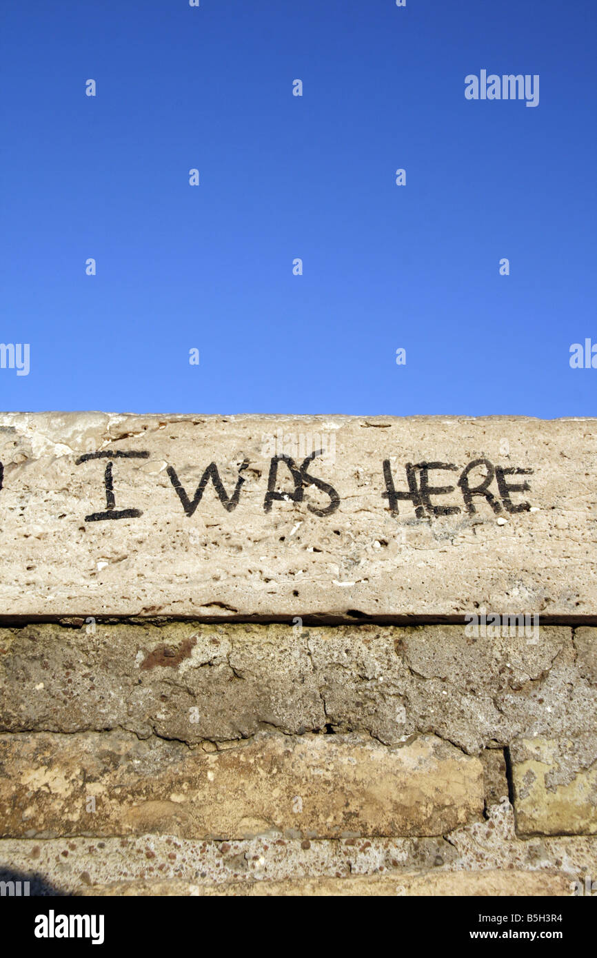 i was here graffiti written on brick wall Stock Photo - Alamy