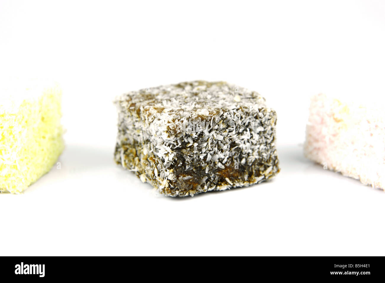 Lamingtons isolated against a white background Stock Photo - Alamy