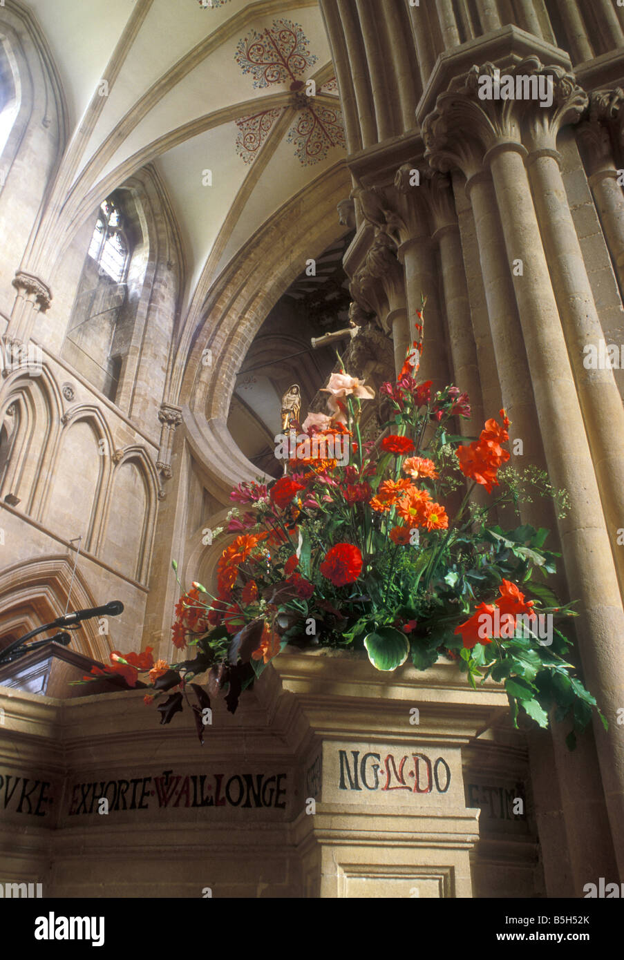 Interior of Wells Cathedral, Wells, Somerset; chancel flowers on a ...