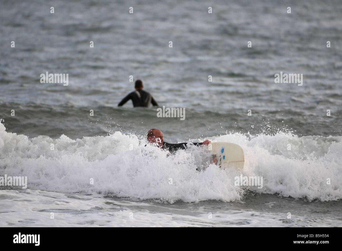 Falling off surfboard hi-res stock photography and images - Alamy