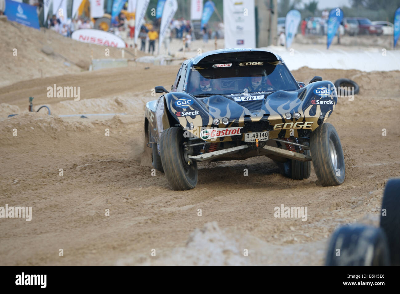 Team Saluki in their 2wd buggy, cornering at speed in the Desert ...