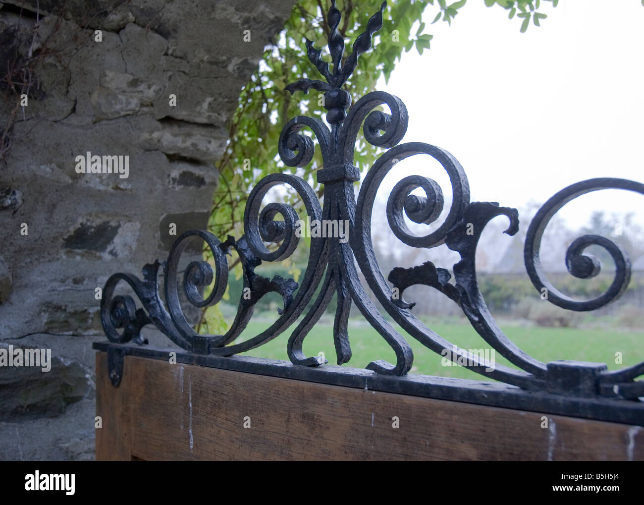 Wrought iron design on top of a door Stock Photo - Alamy