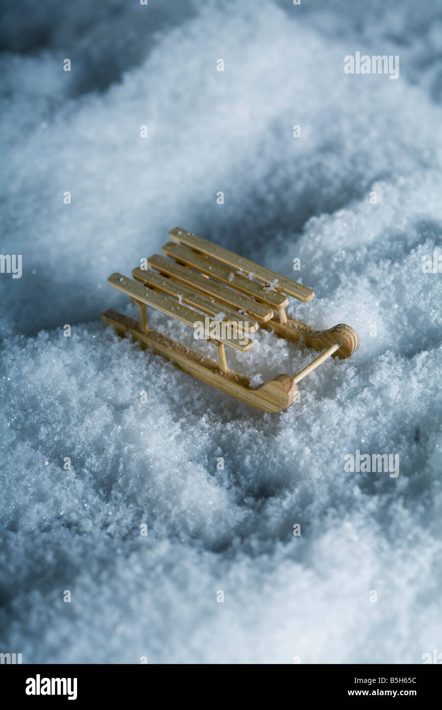 Wooden Sled on Snow Stock Photo - Alamy