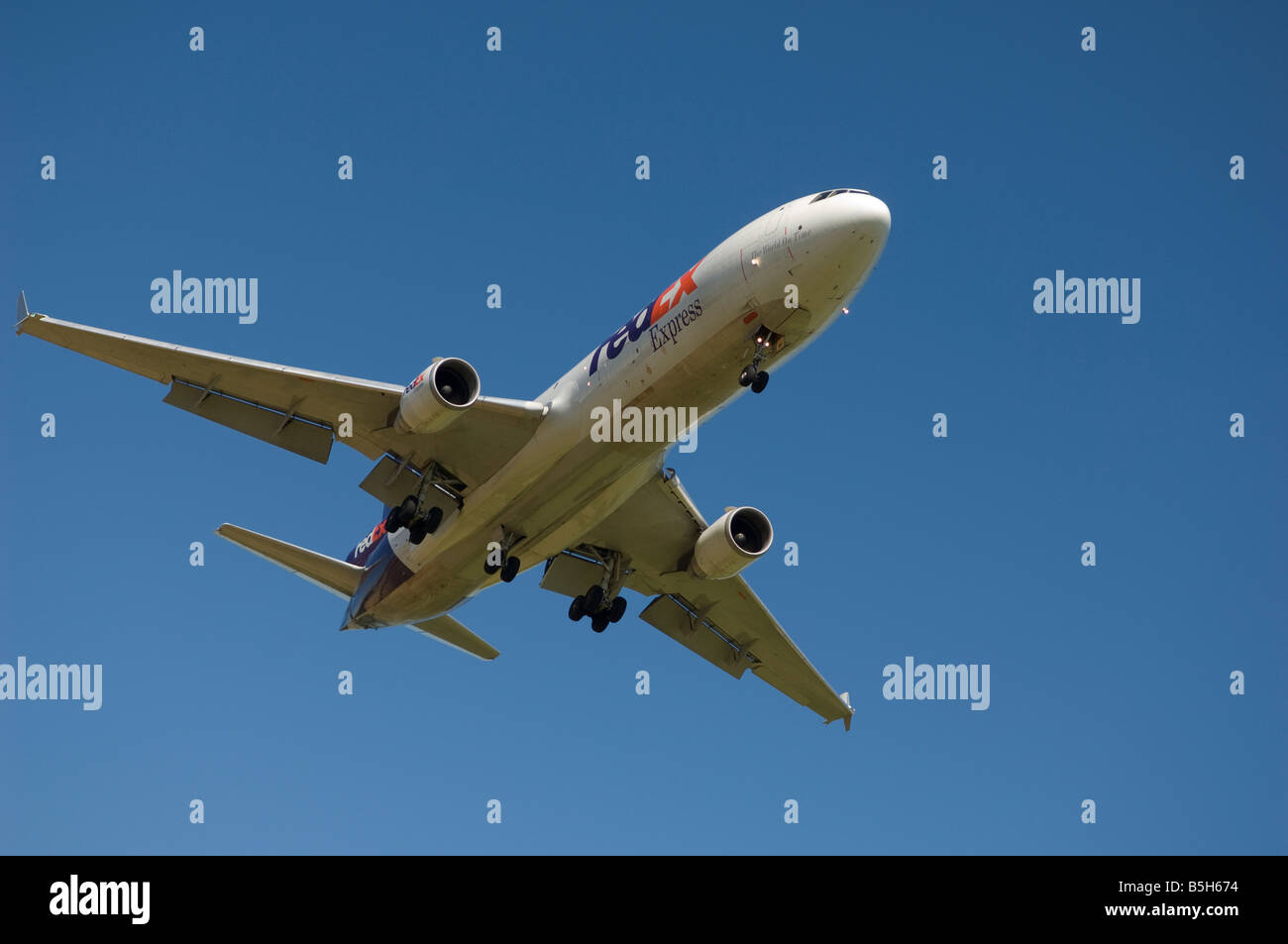 FedEx cargo plane in flight Stock Photo - Alamy