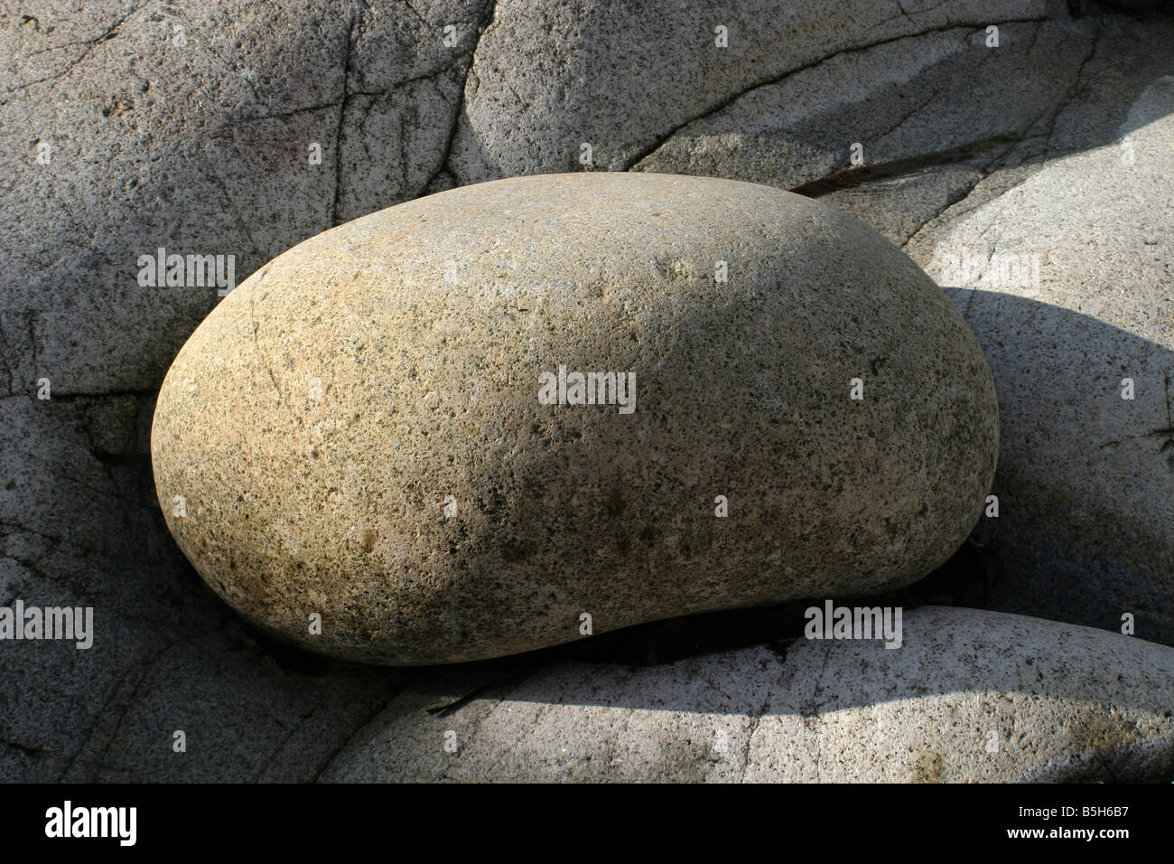 Big smooth stone pebble Cornwall UK Stock Photo - Alamy