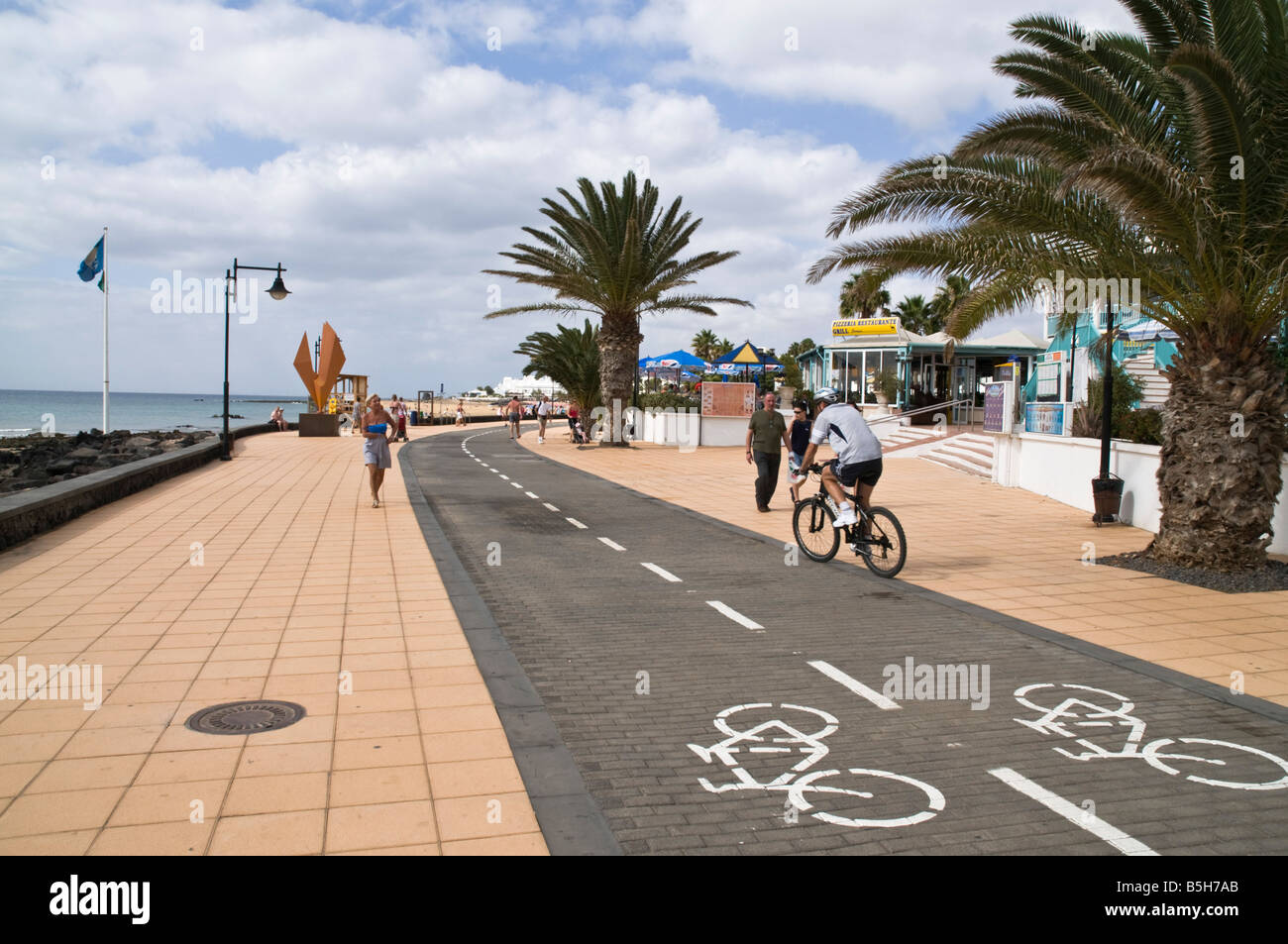 dh Playa Matagorda MATAGORDA LANZAROTE Cyclist on cyclepath and people ...