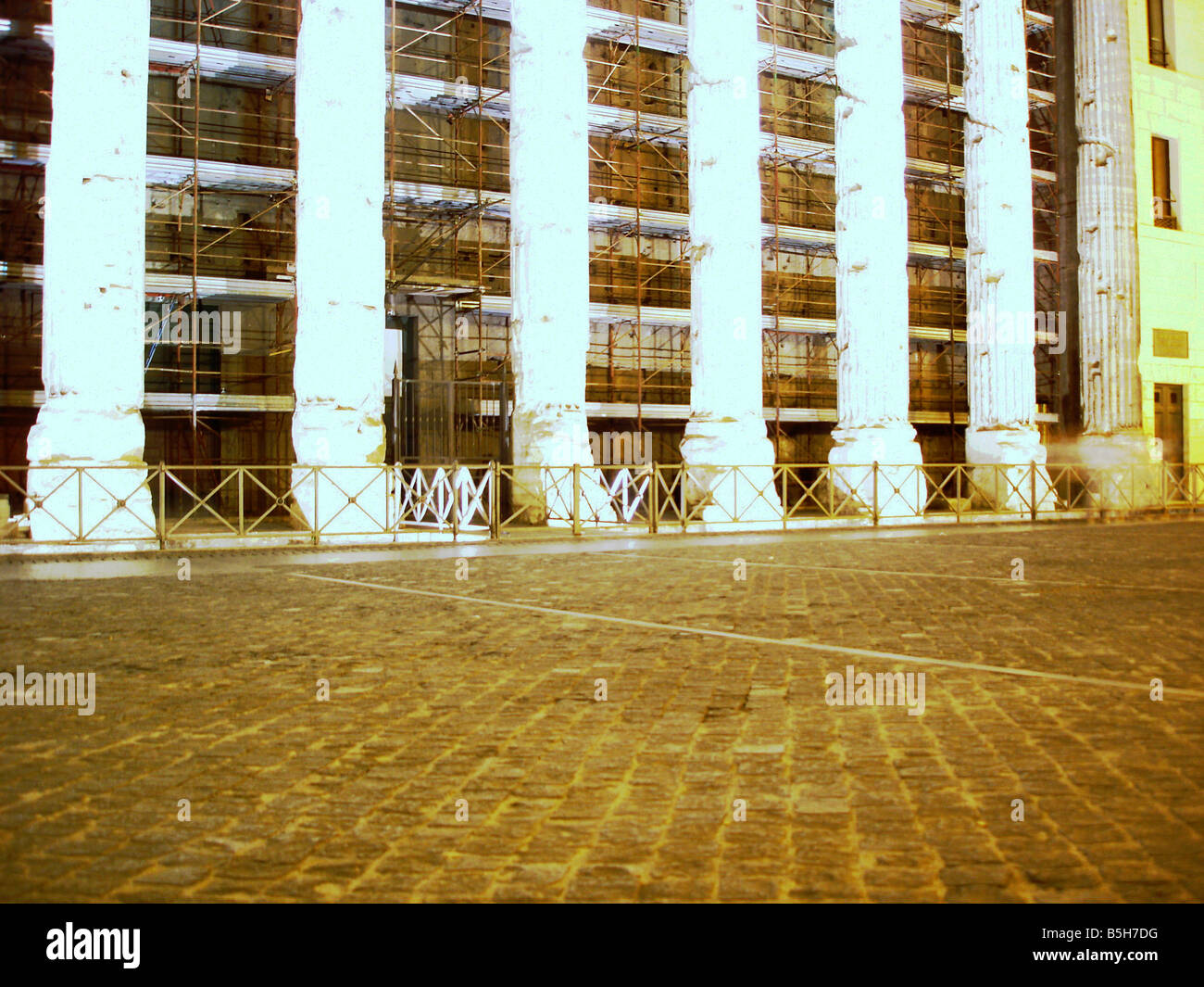 Night shot of a historic building undergoing renovations Stock Photo ...