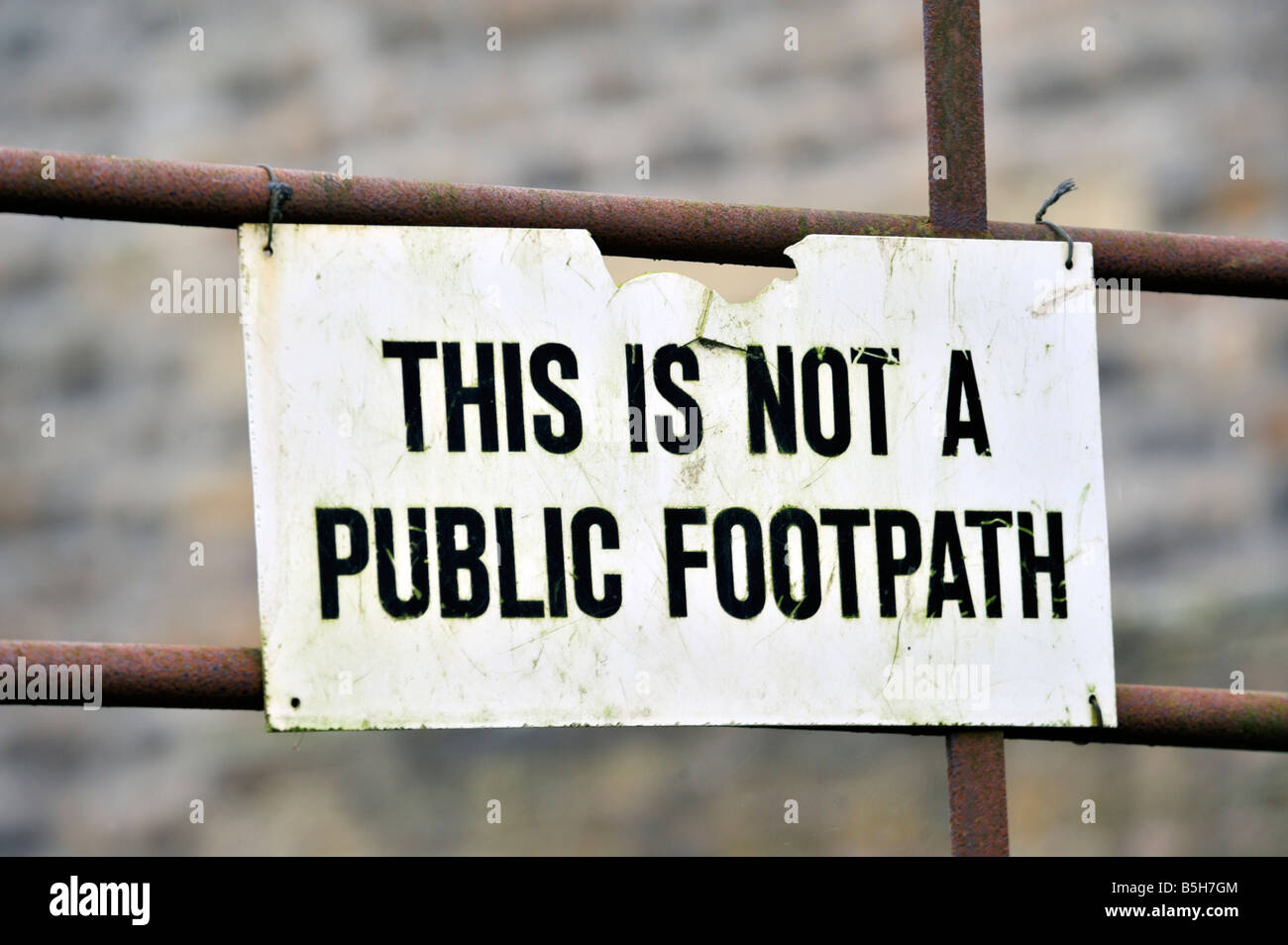 Damaged footpath sign hi-res stock photography and images - Alamy