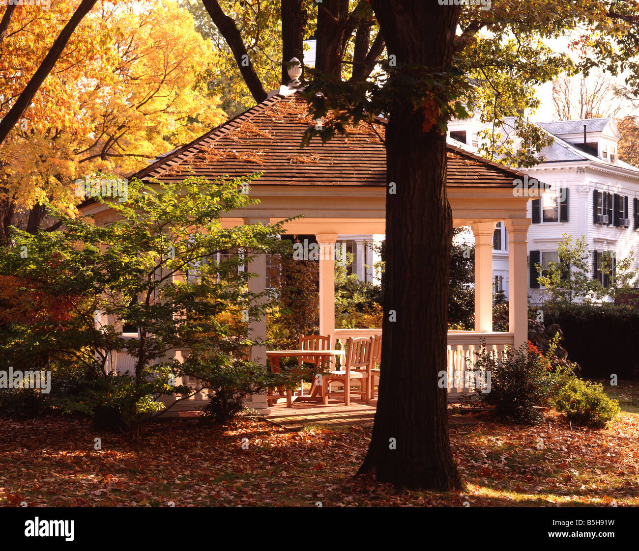 Gazebo with Mansion in Autumn Stock Photo - Alamy