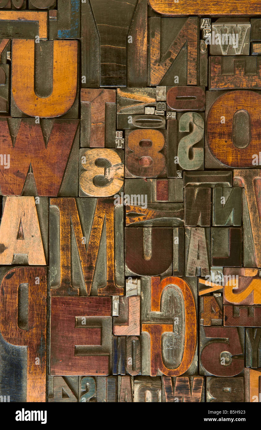 An assortment of old wooden and metal type blocks Stock Photo - Alamy