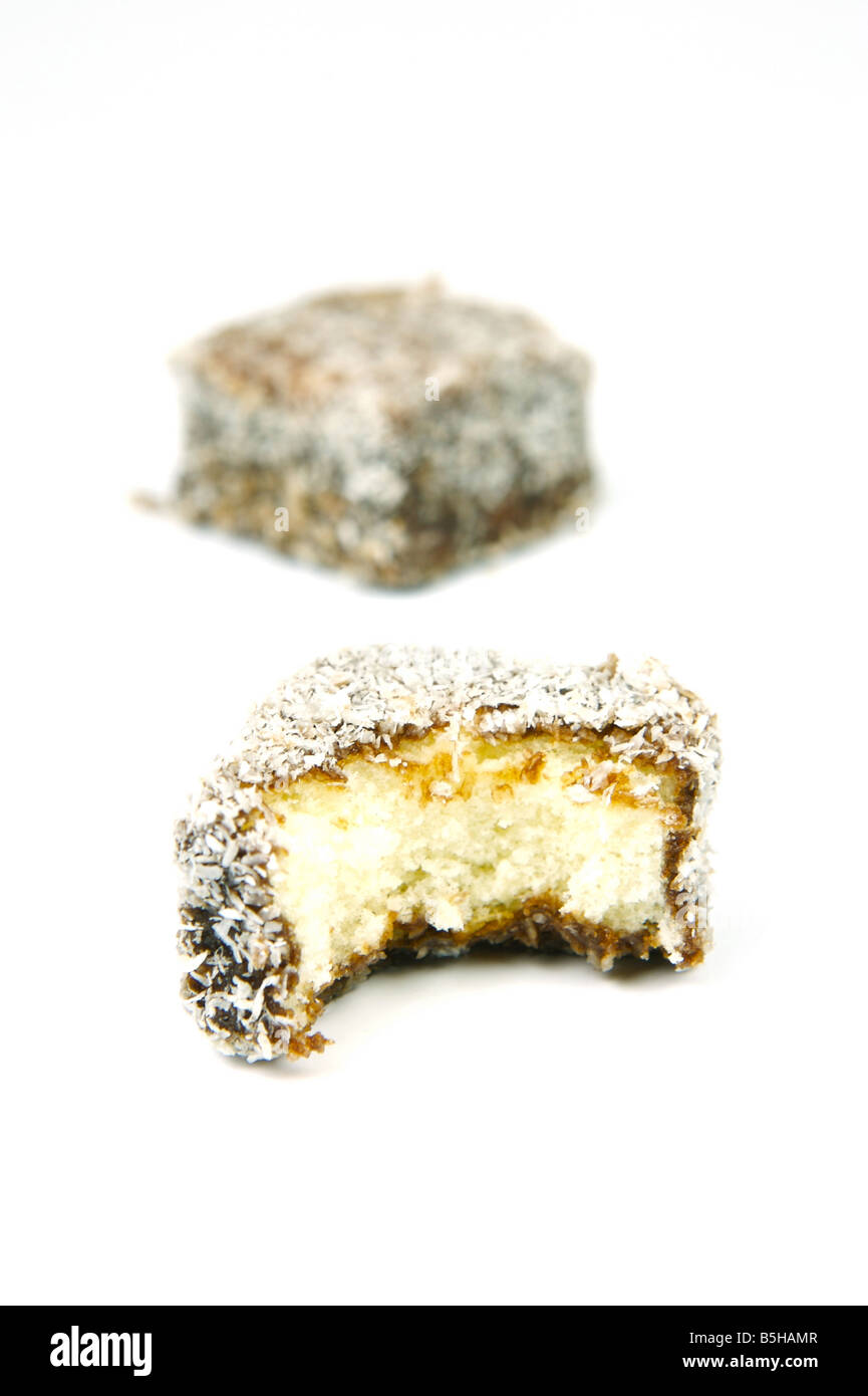 Lamingtons isolated against a white background Stock Photo - Alamy