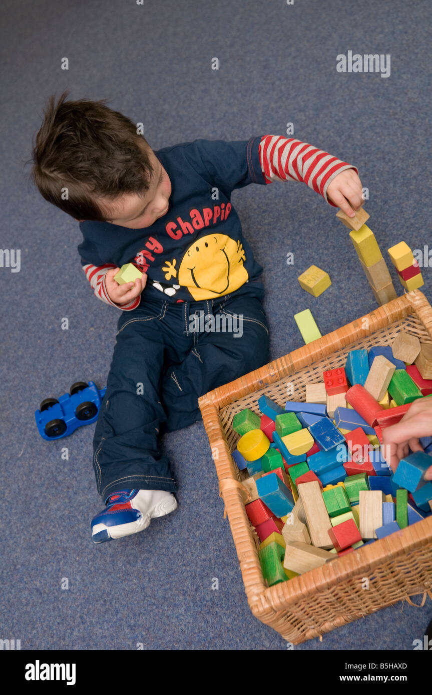 Boy stacking blocks school hi-res stock photography and images - Alamy