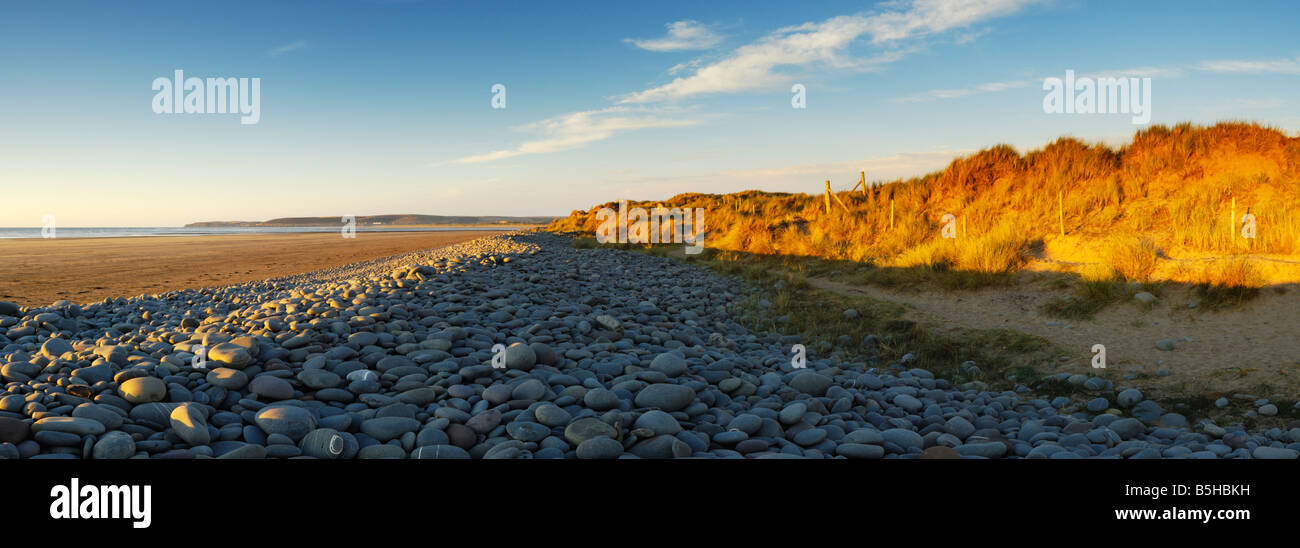 The pebble ridge at Westward Ho! beach by Northam Burrows sand dunes ...