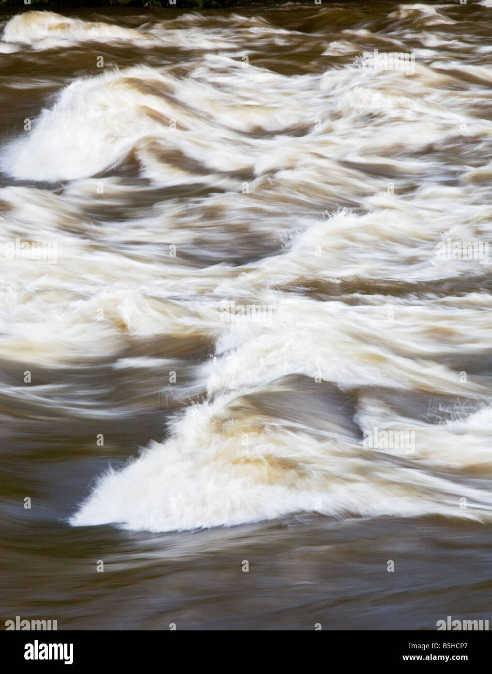 Stream of river water cascading Stock Photo - Alamy