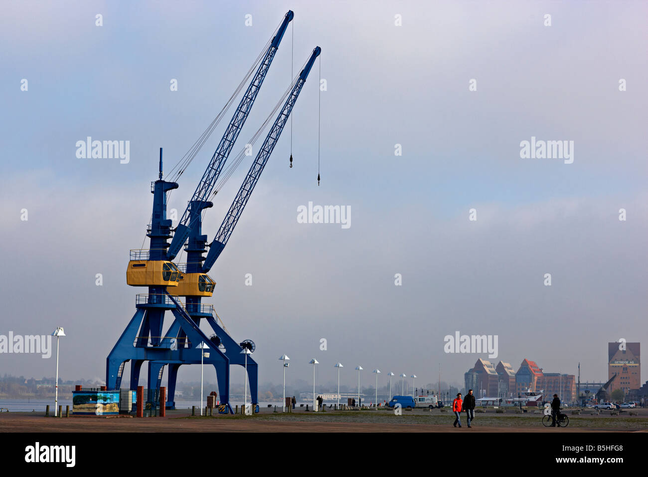 Old cranes as design elements in Rostock, Germany Stock Photo - Alamy