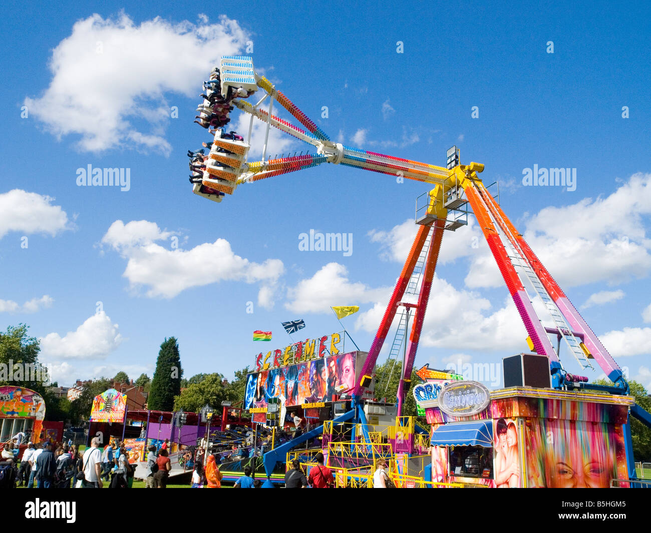 A colourful fairground ride, at the Caribbean Carnival in Nottingham ...