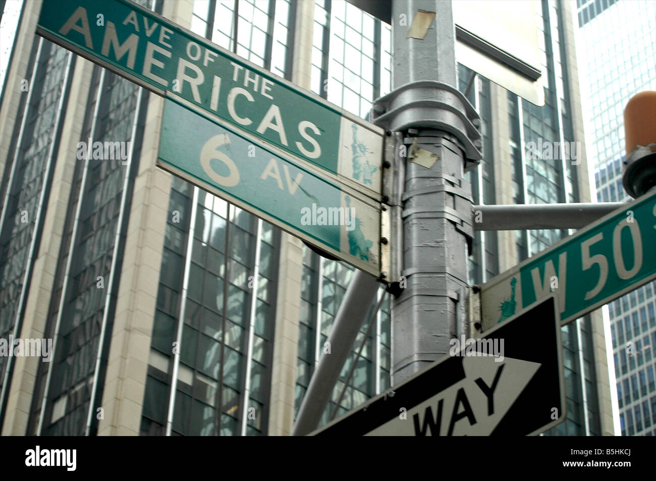 Avenue of the America's and 6th Avenue Sign in New York Stock Photo - Alamy