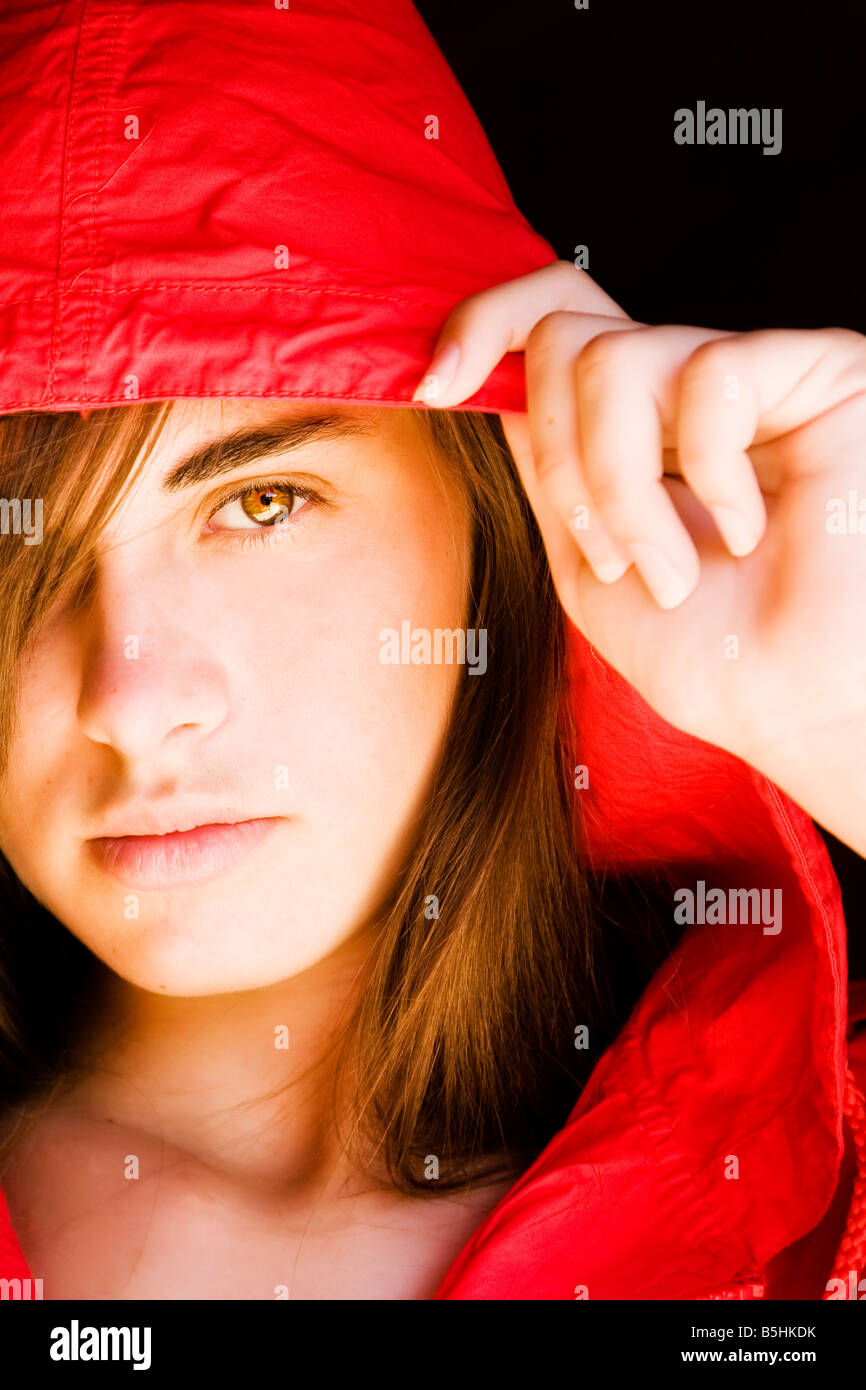 Young woman staring at camera Stock Photo - Alamy
