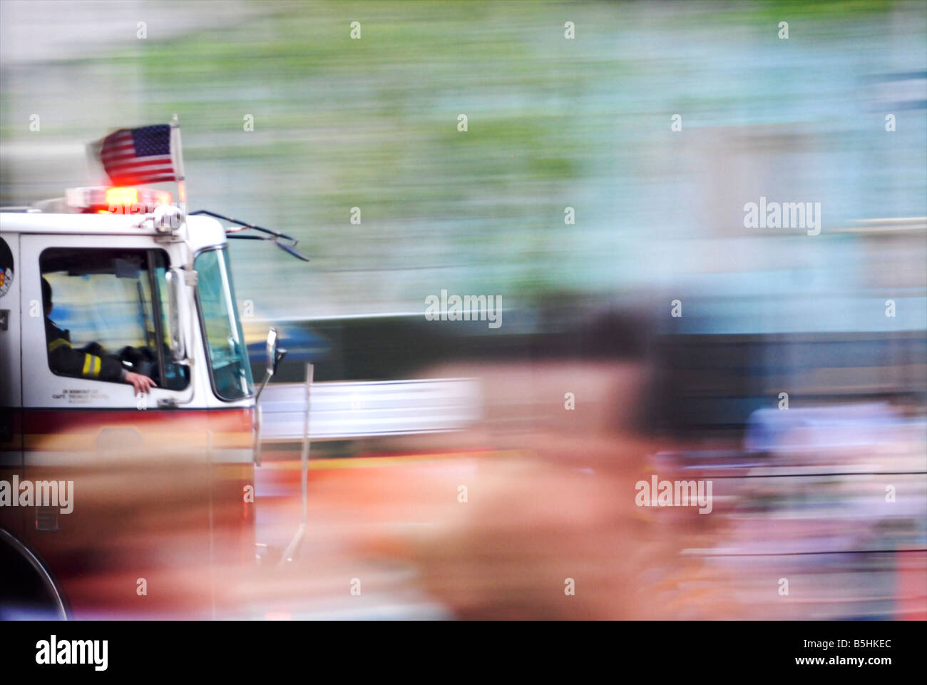 Motion Blur when a Fire engine truck passes us by in New York Stock ...