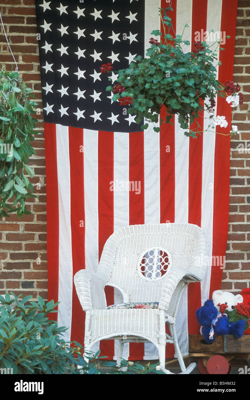 US flag rocking chair and teddy bear on porch of Orth House B and B ...