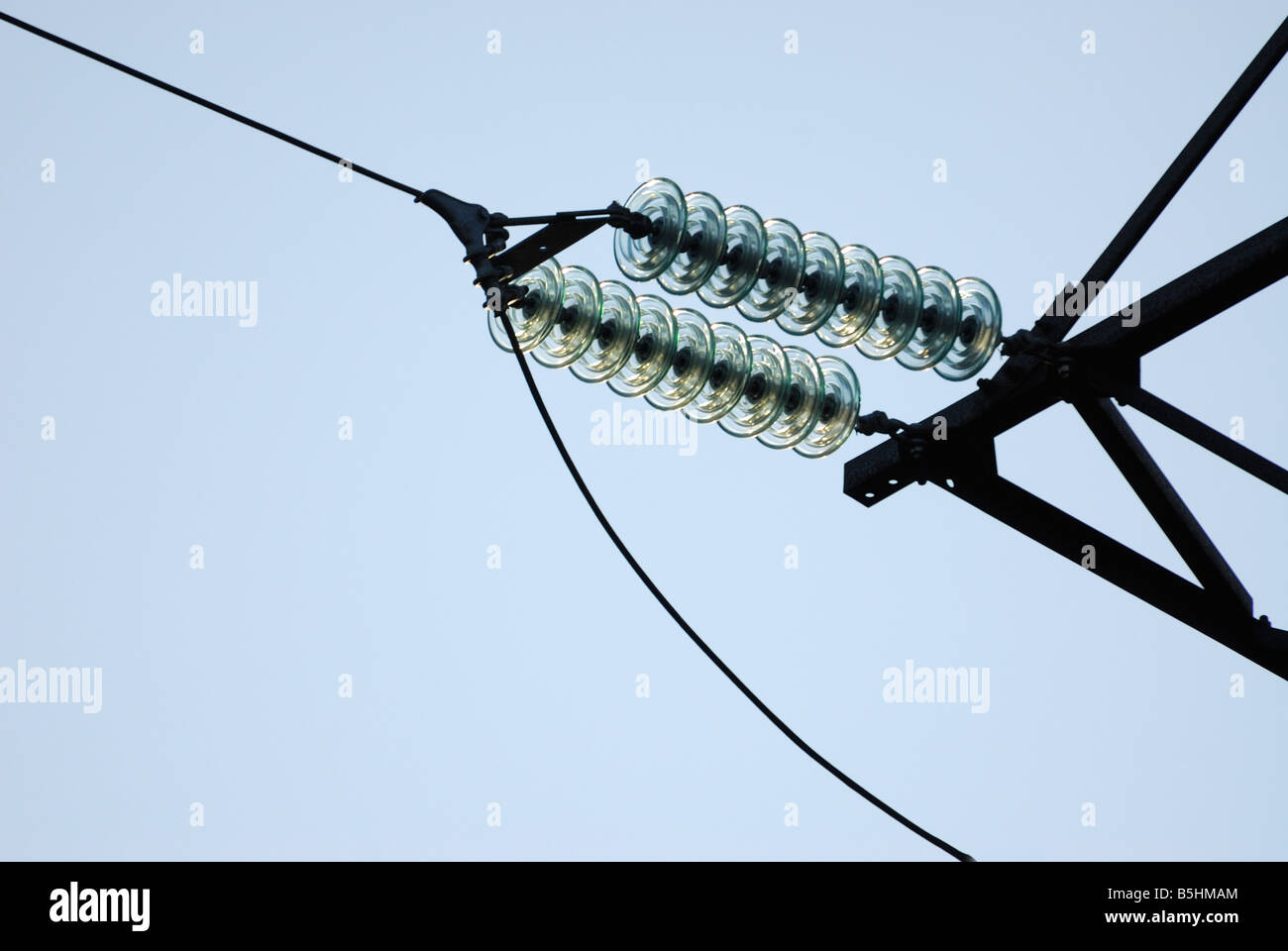 Two glass isolators of the power pole Stock Photo - Alamy