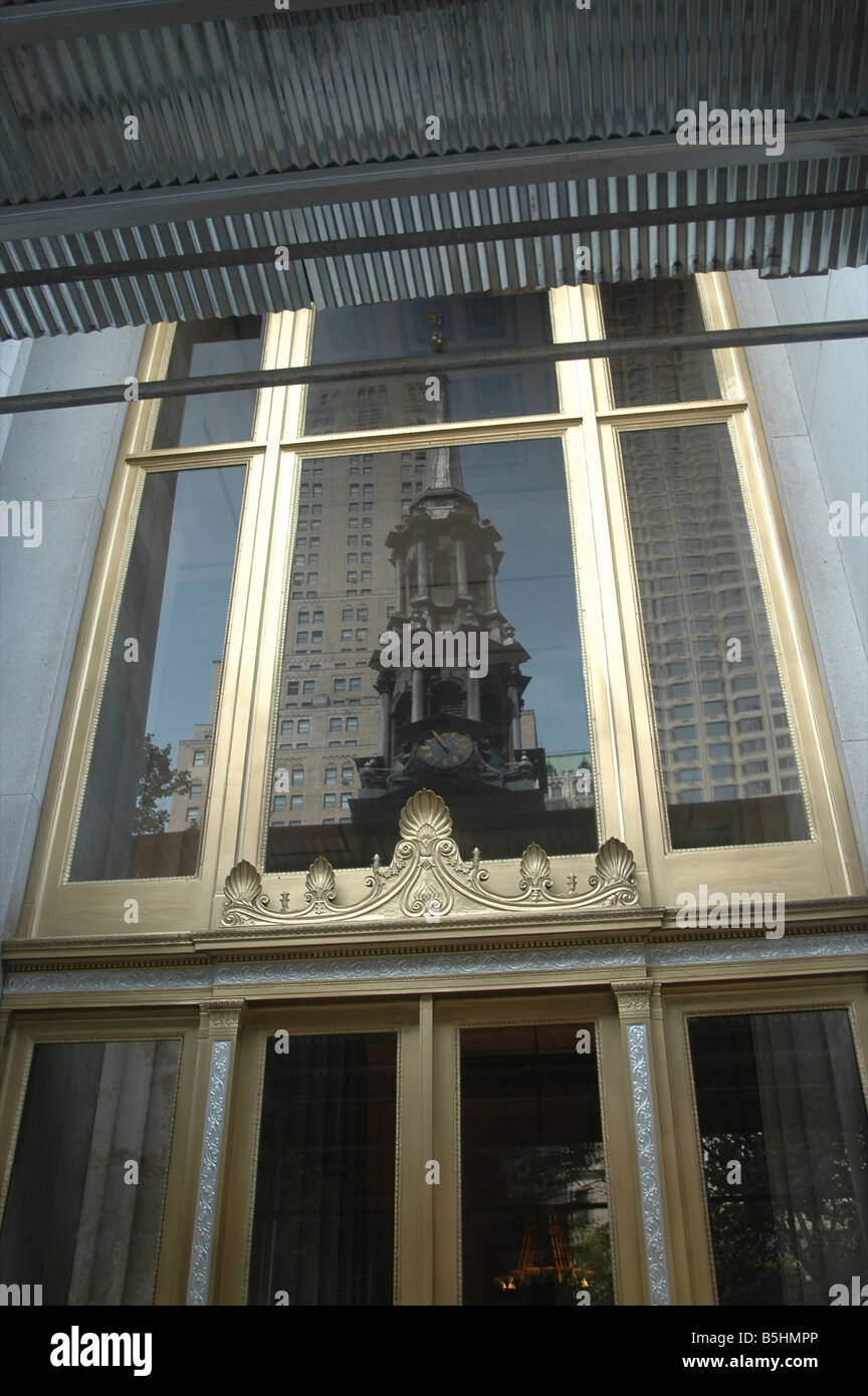A reflection of Trinity Church in one of the surrounding High Rise ...