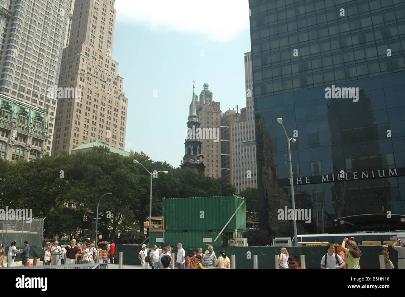 Trinity Church and The Millemium at Ground Zero in Manhattan, New York ...
