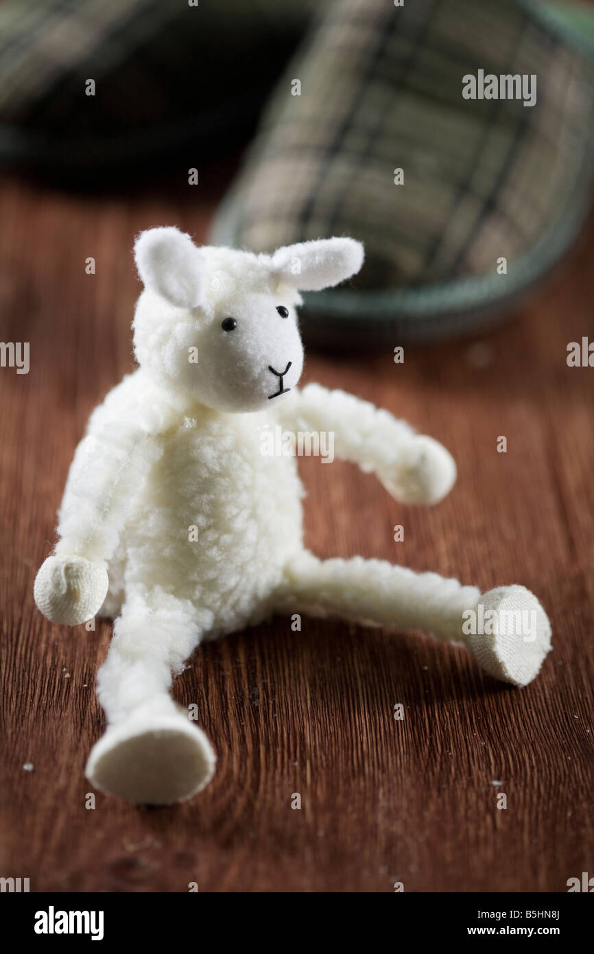 White toy sheep sitting Stock Photo - Alamy