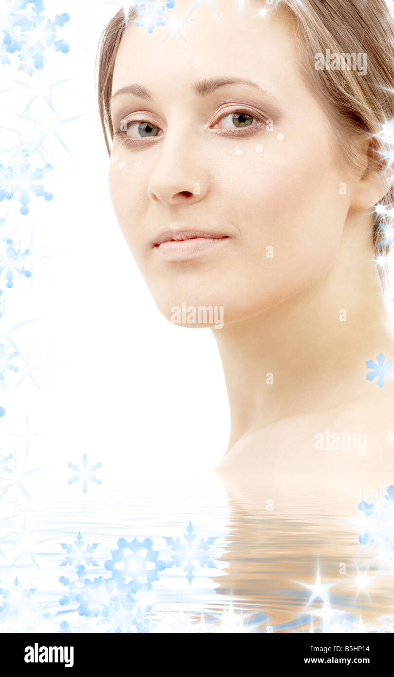 beautiful woman with moisturizing milk drops on face in water Stock ...