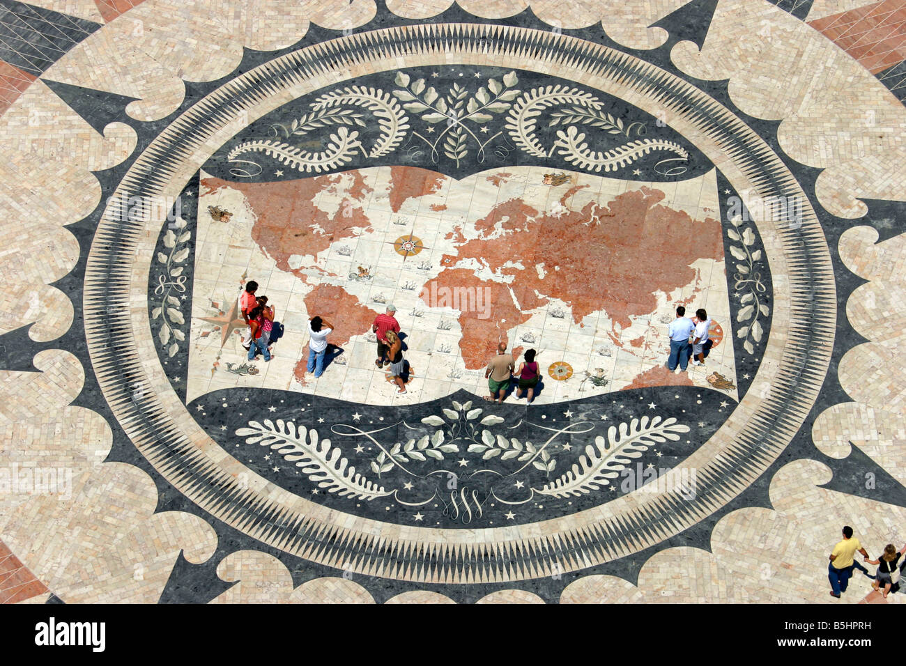 mosaic representing a compass with the map of the world Stock Photo - Alamy