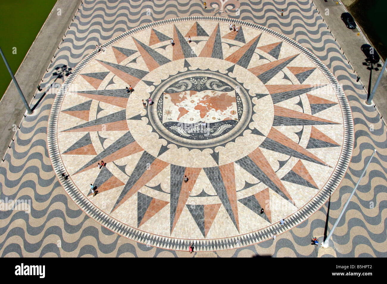 mosaic representing a compass with the map of the world Stock Photo - Alamy