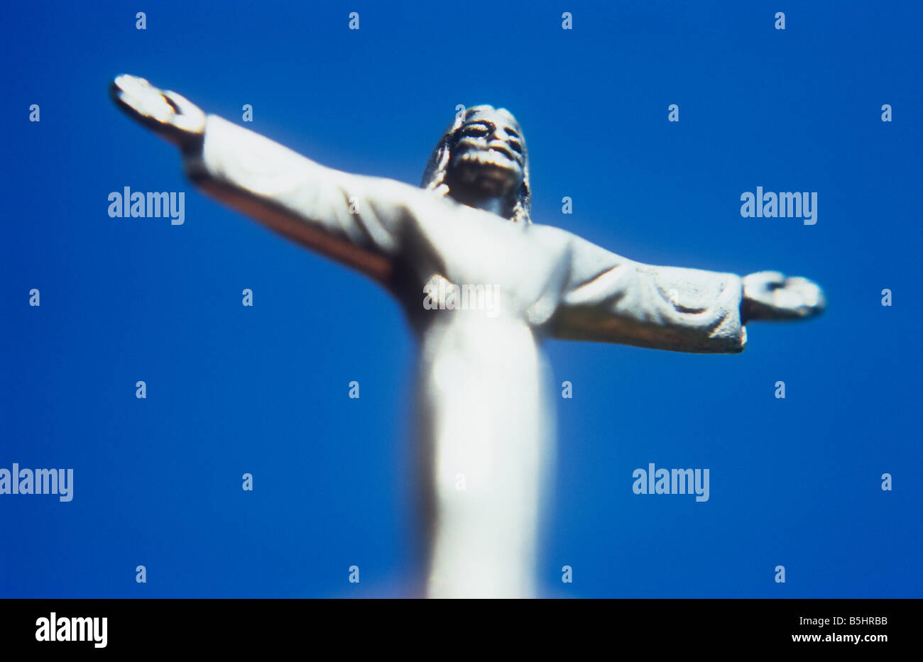 Impressionistic Jesus Christ figure in silver with arms outstretched ...