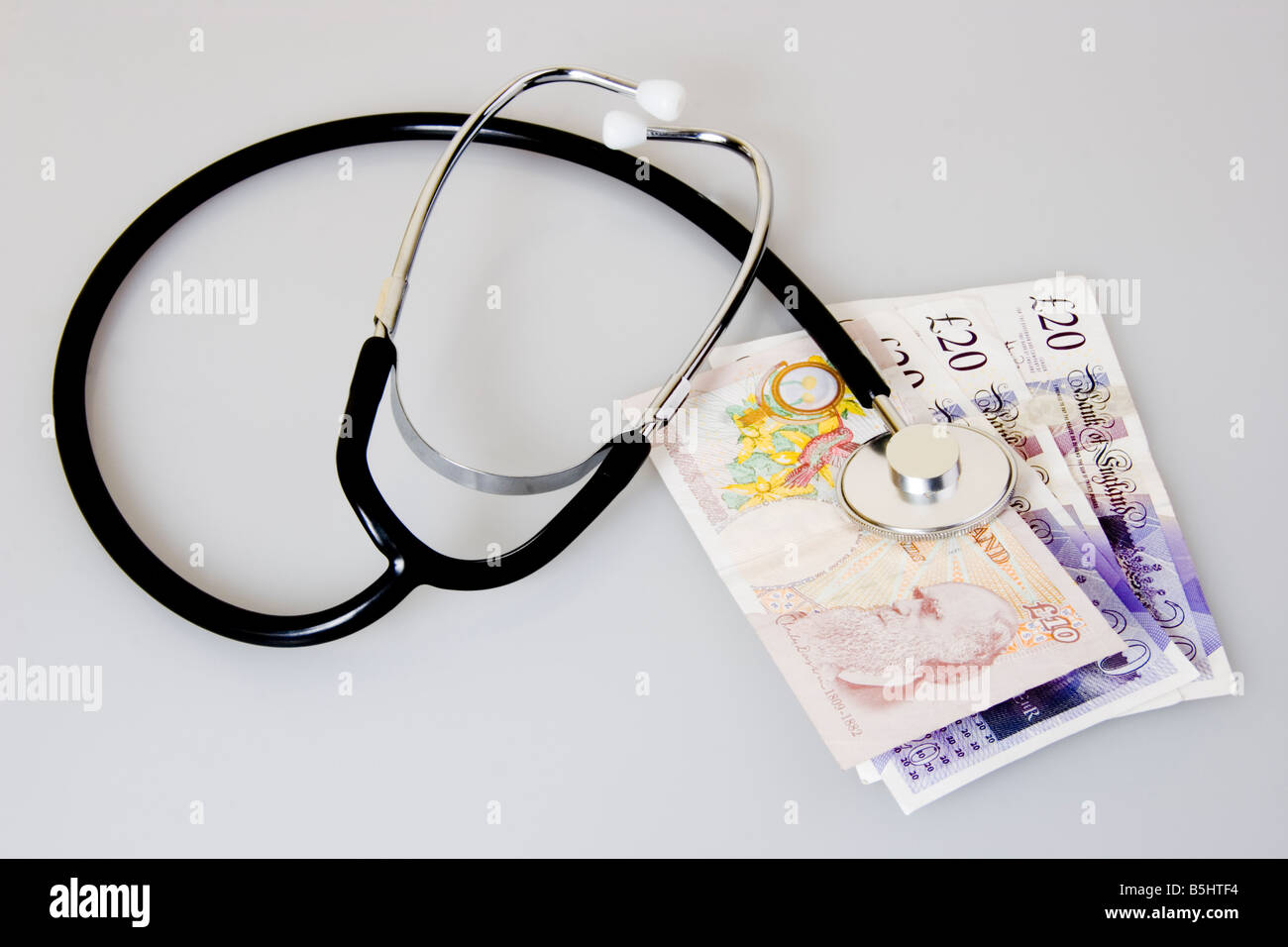 Medical stethoscope and money Stock Photo - Alamy