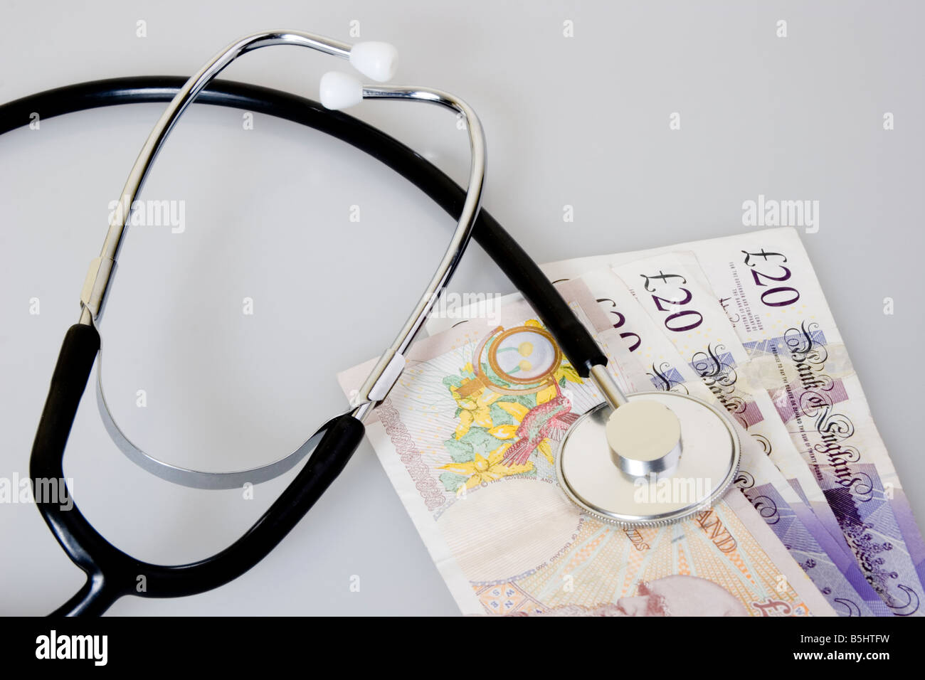 Medical stethoscope and money Stock Photo - Alamy