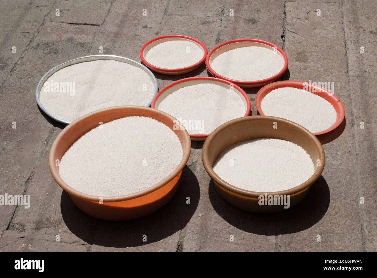 Seven bowls of Vietnamese rice - temple offerings Stock Photo - Alamy
