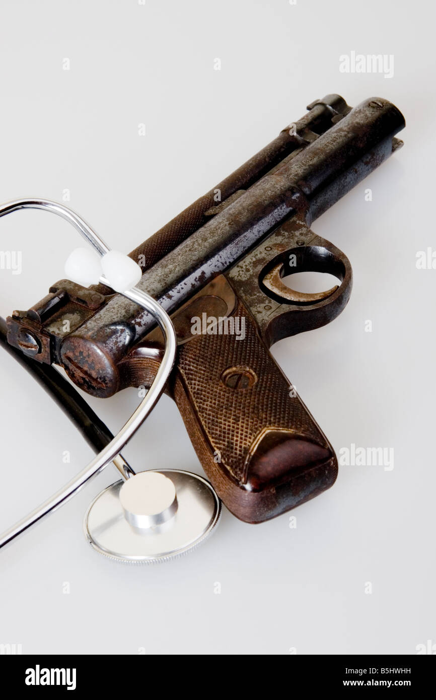 Gun and stethoscope Stock Photo - Alamy
