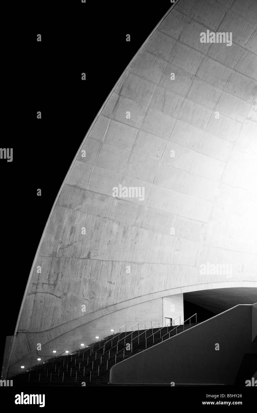 Odd curved structure at night Stock Photo - Alamy