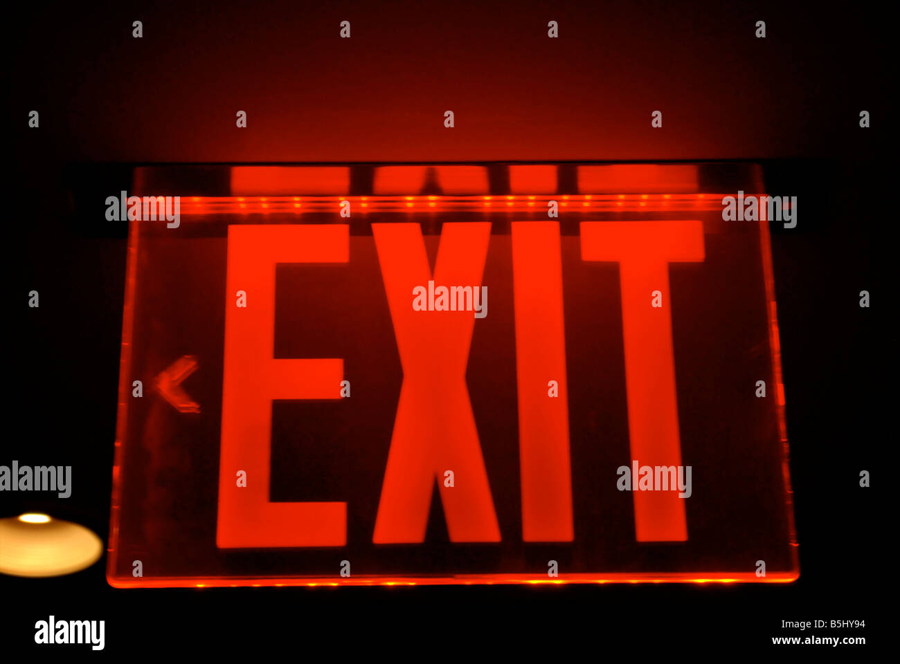 Red Neon Exit sign in New York Hotel Stock Photo - Alamy