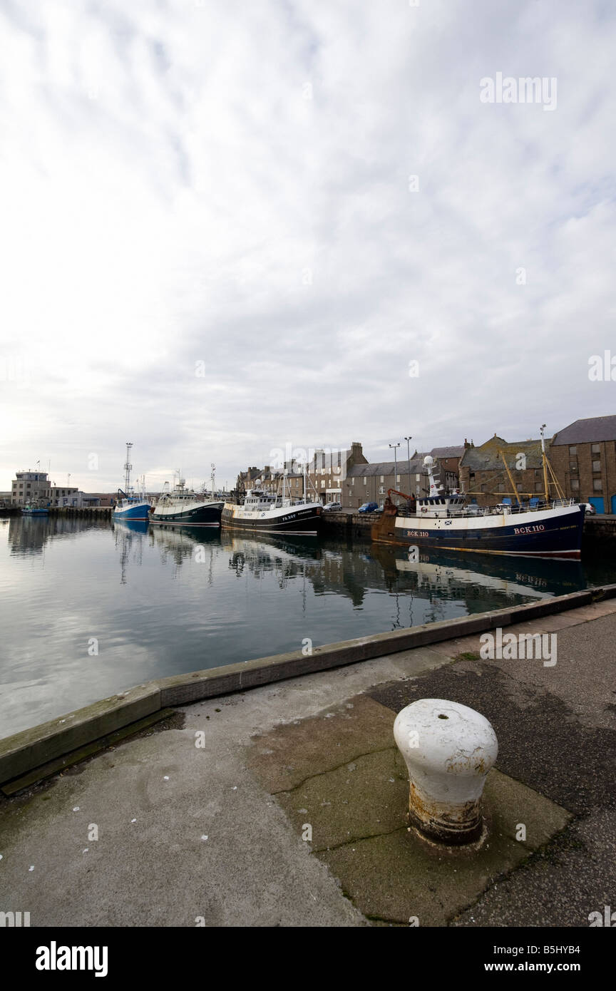 Fishing boats moored at the port of Peterhead, Aberdeenshire, Scotland ...