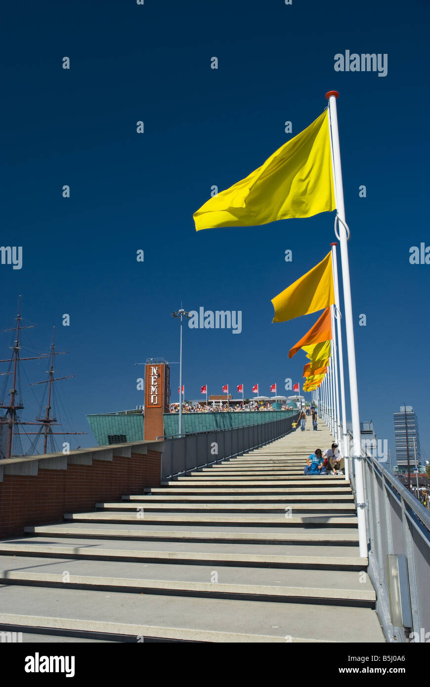 Flags line a stair case leading up to the NEMO science museum on the ...