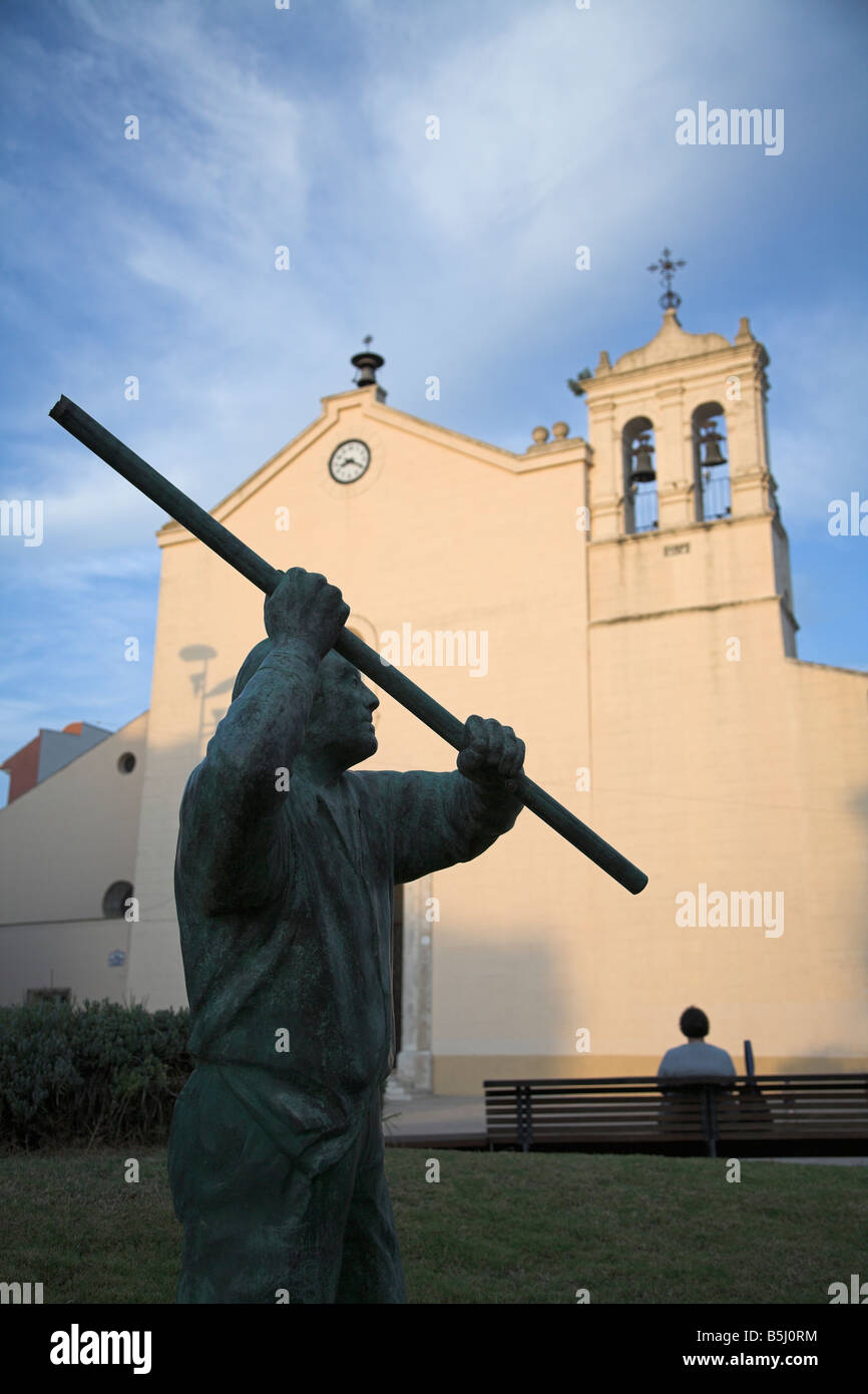 Statue of Olive beater in front of Church of Our Lady of Guadalupe ...