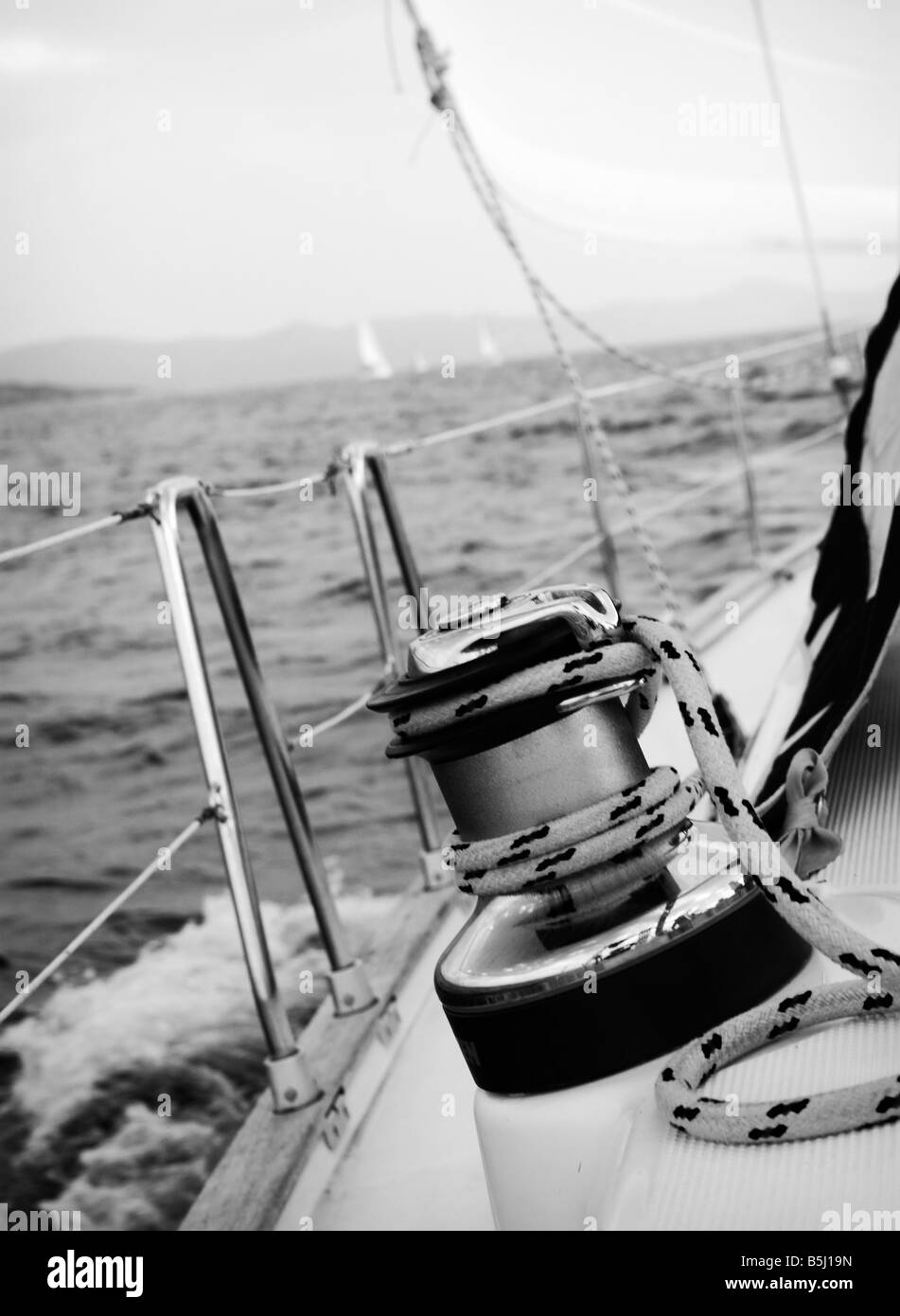 capstan force winch rope line speed waves white sea lonely racing yacht ...