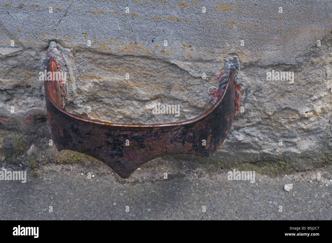 An ancient boot scraper for removing, mud from boots, set into a wall ...