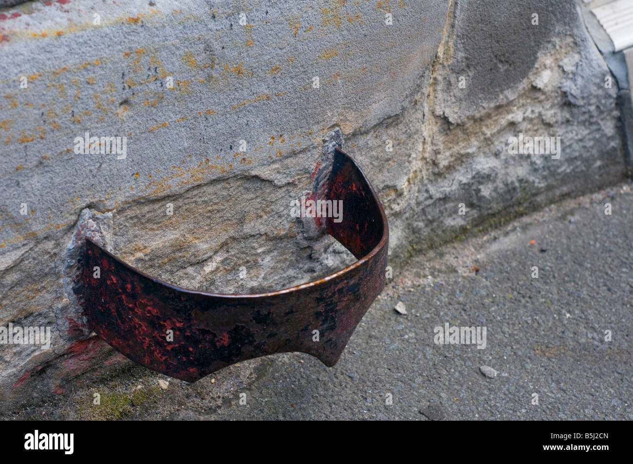 An ancient boot scraper for removing, mud from boots, set into a wall ...