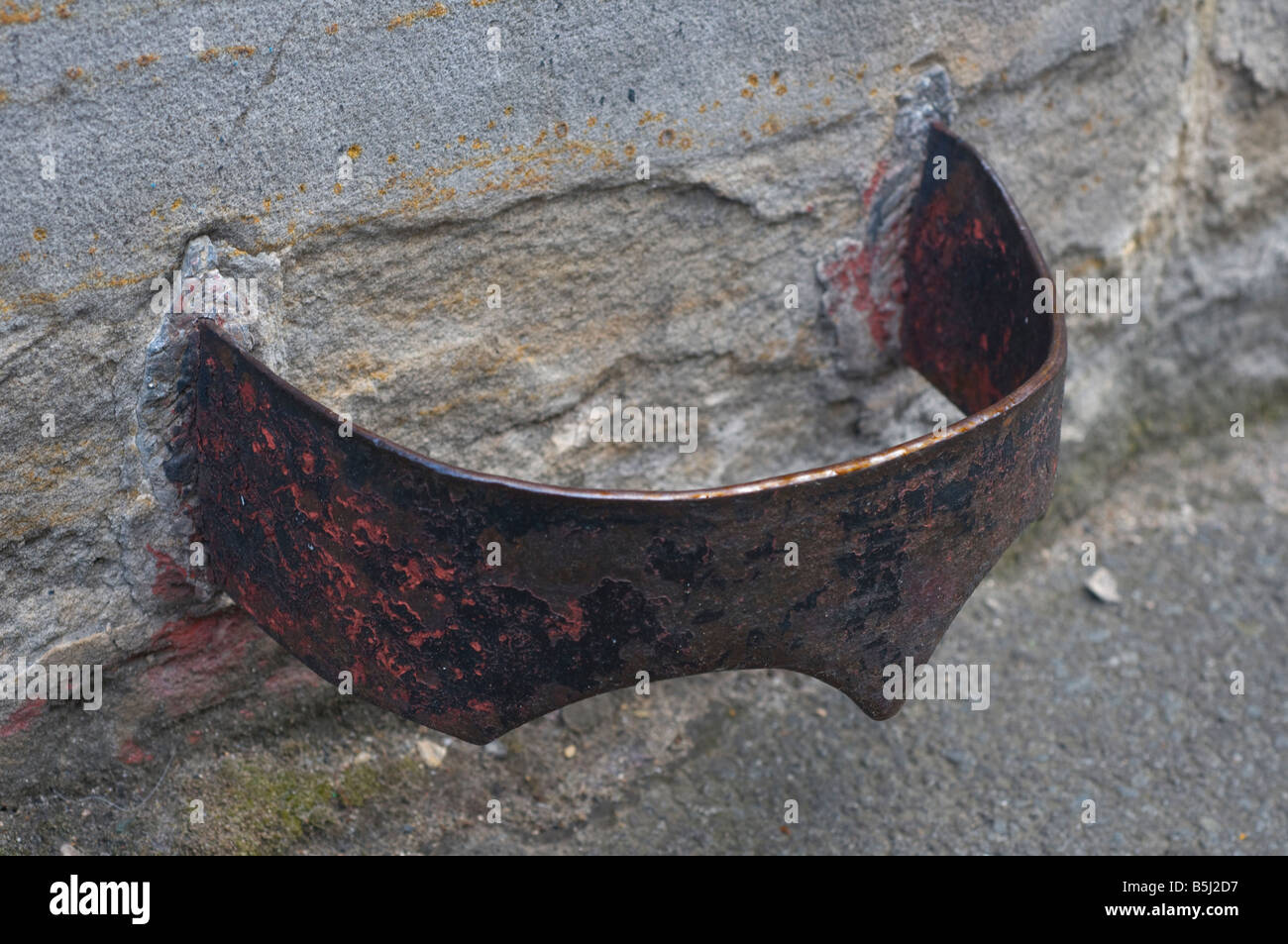 An ancient boot scraper for removing, mud from boots, set into a wall ...