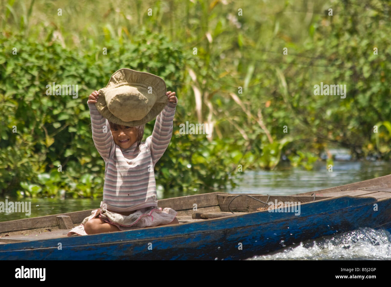 Child in fishing boat hi-res stock photography and images - Alamy