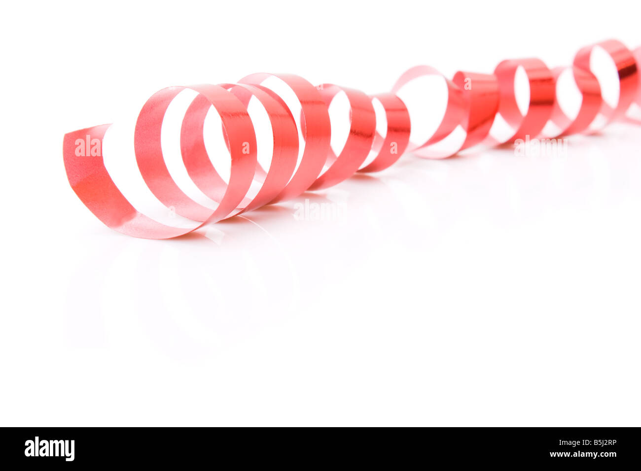 Bright red ribbon isolated on white background Stock Photo - Alamy