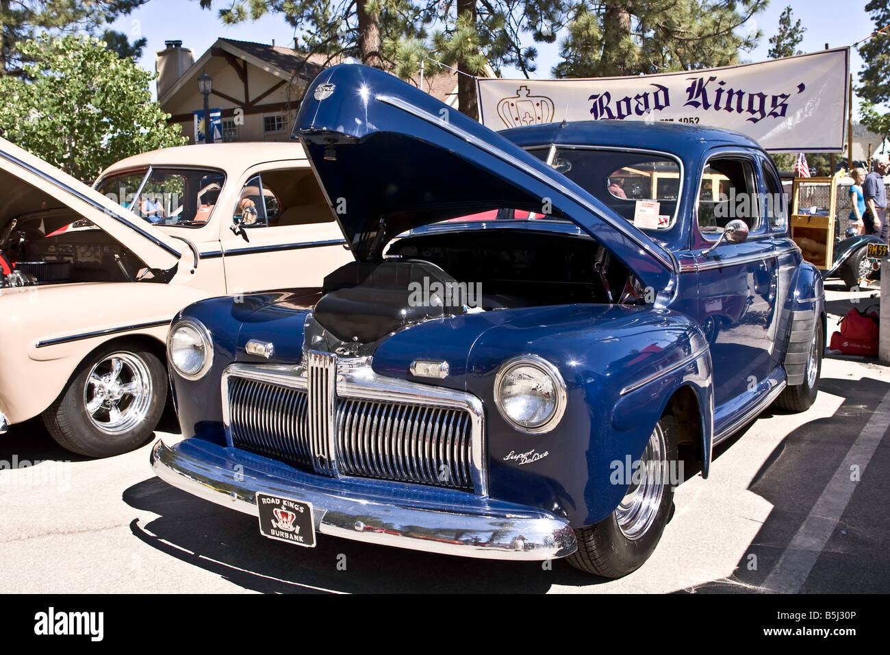 Blue Ford V8 Super Deluxe coupe Stock Photo - Alamy