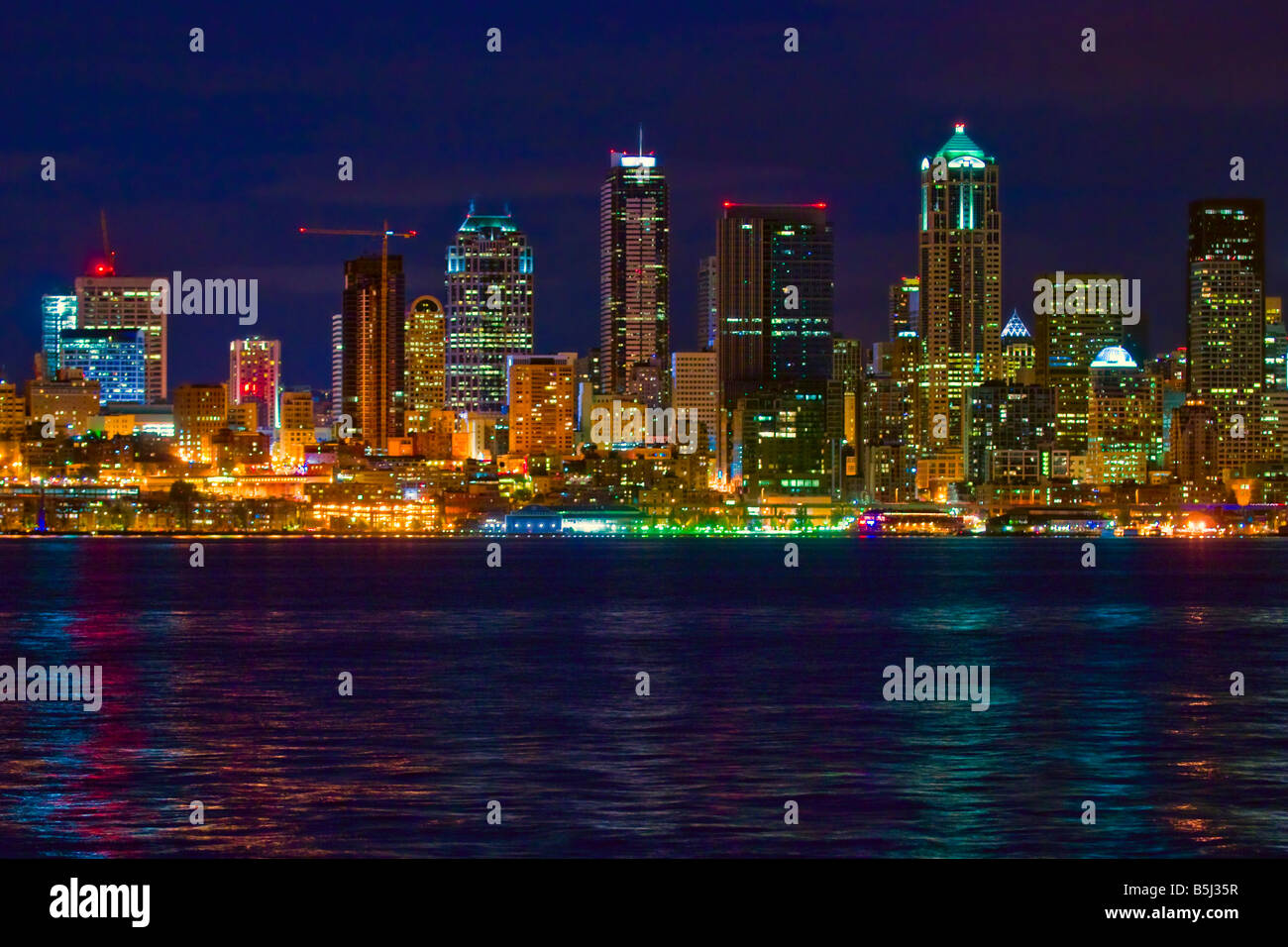 Colorful Seattle skyline at night Stock Photo - Alamy